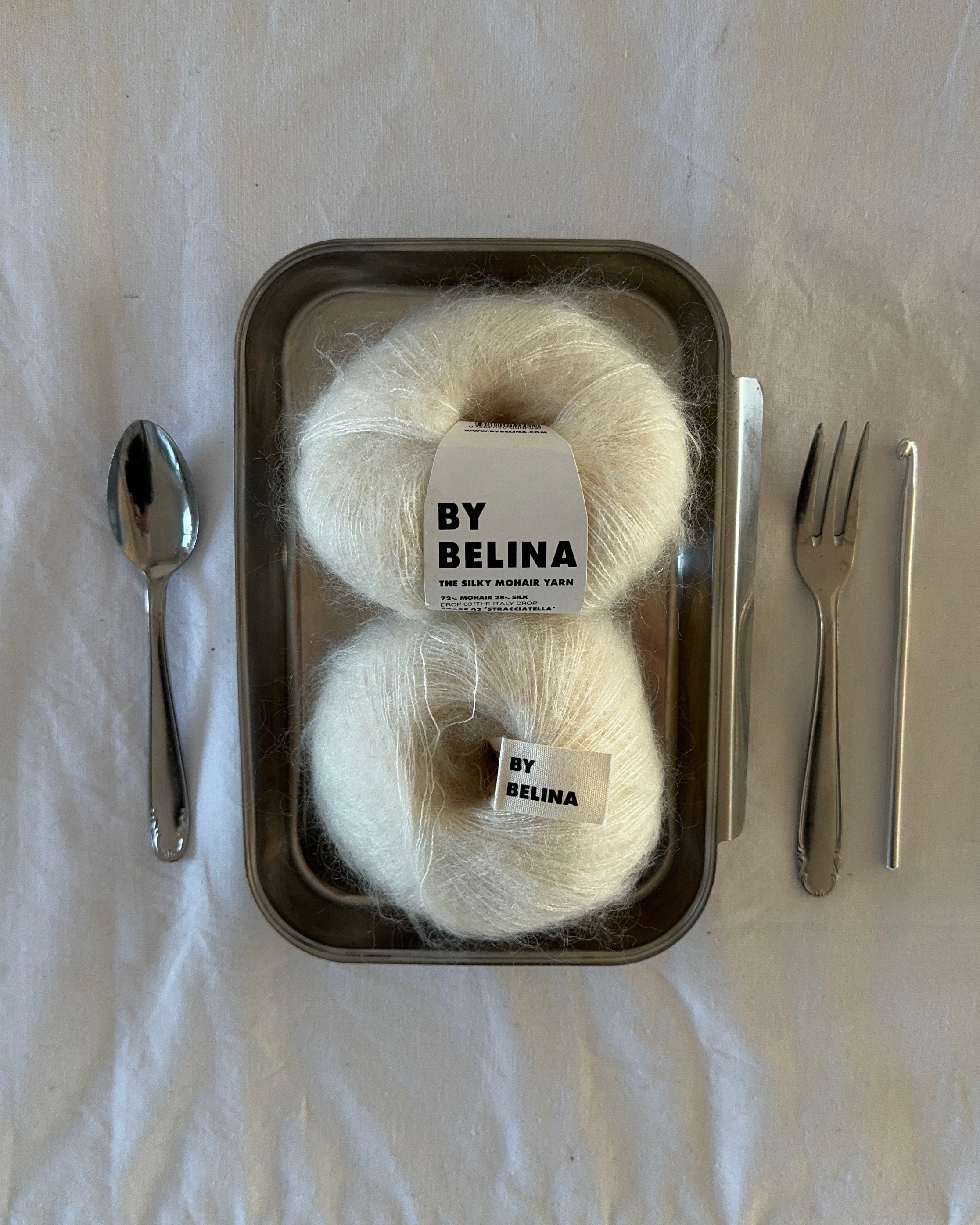 BY BELINA